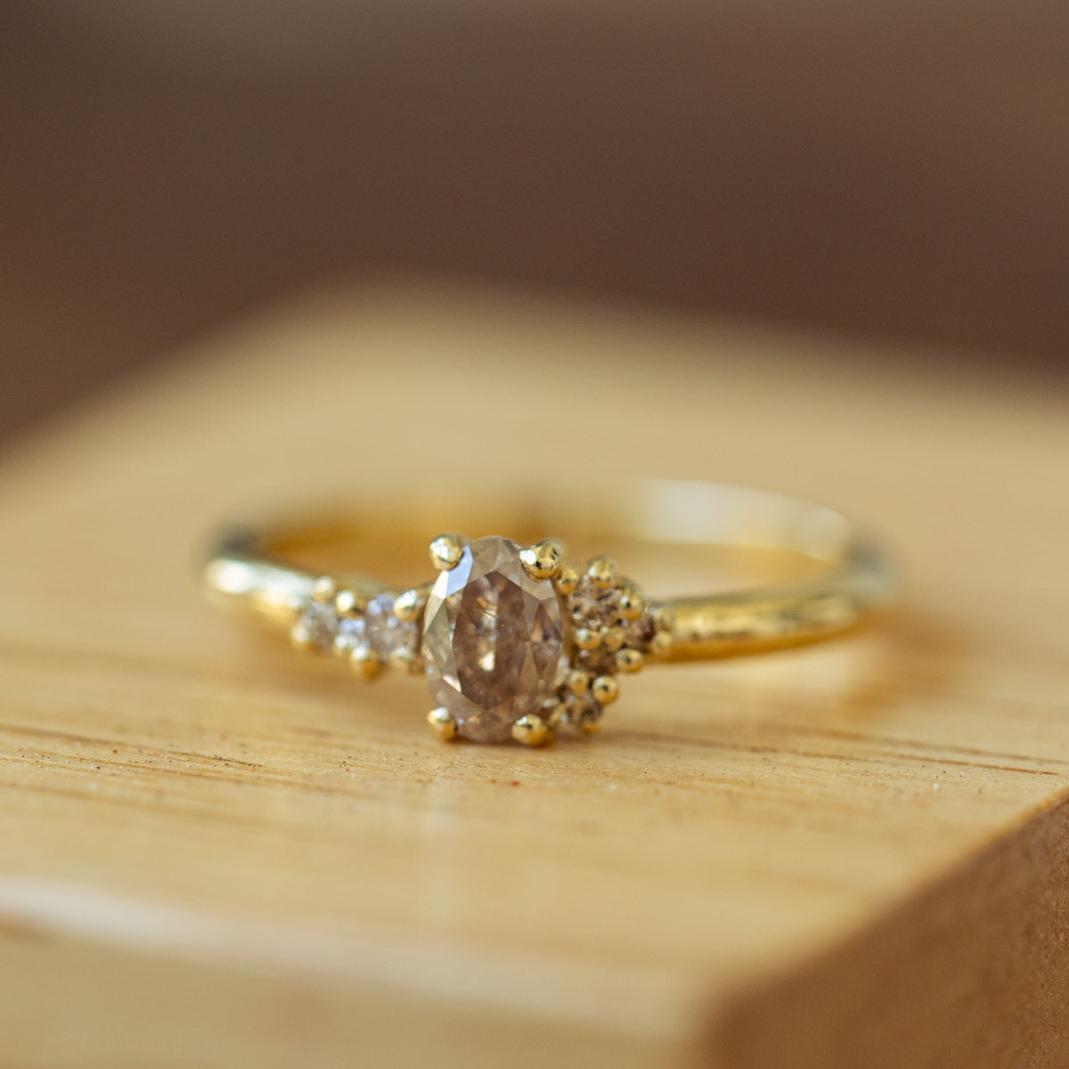 Oval champagne asymmetrical cluster ring – Kwintner